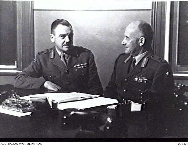 MELBOURNE, VIC. 1946-03-11. MAJOR-GENERAL CHAPMAN (LEFT) HANDING OVER ...