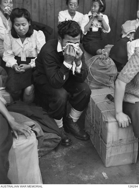 SYDNEY, NSW. 1946-03-06. A YOUNG FORMOSAN MAN WEEPS BITTERLY WHEN HE ...