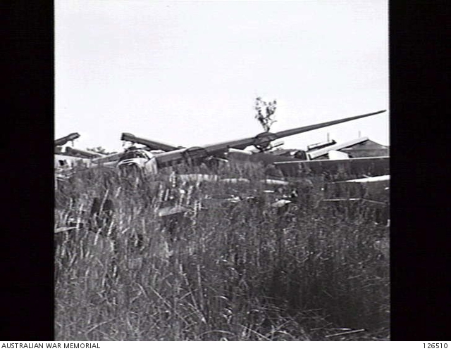 DARWIN, NT. 1946-03-15. AN AIRCRAFT DUMP WHERE OLD LIBERATORS ARE BEING ...