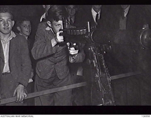 SYDNEY, NSW. 1946-03-28. SCHOOLBOY KEITH ROWLAT EXPERIMENTING WITH A ...