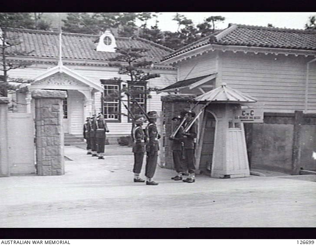 KURE, JAPAN. 1946-03-22. THE CHANGING OF THE GUARD BY TROOPS OF 65TH ...