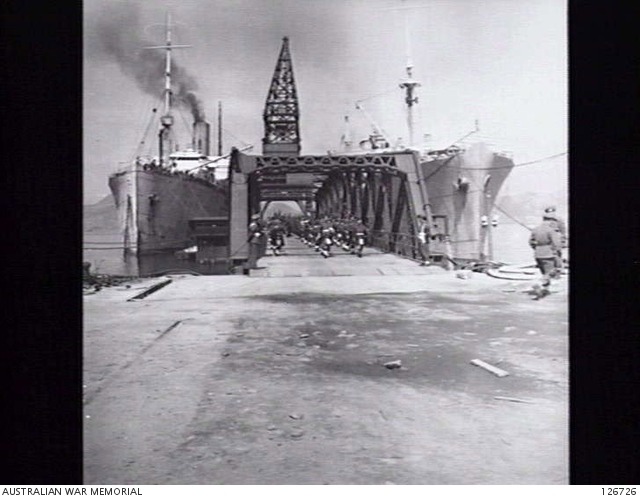 KURE HARBOUR, JAPAN. 1946-03-30. QUEEN'S OWN CAMERON HIGHLANDERS MARCH ...