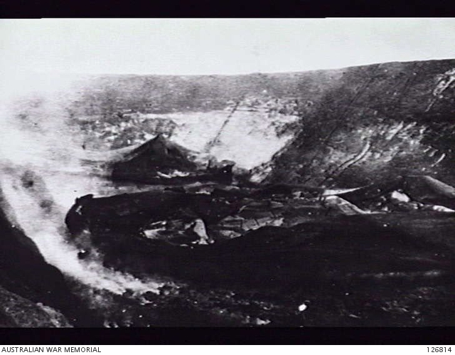 DARWIN, NT. 1942-02-19. REMAINS OF BURNT-OUT TANKS DESTROYED IN THE ...