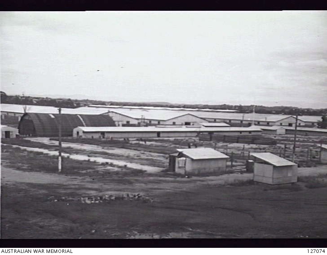 BANYO, QLD. 1946-05-17. EXTERIOR VIEW OF CAMP BUILDINGS AND SURROUNDING ...