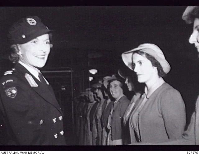 ARCHERFIELD, QLD. 1946-04-22. LADY MOUNTBATTEN SHAKES HANDS WITH DAPHNE ...
