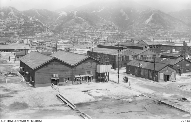 KURE, JAPAN. 1946-04-27. ELEVATED VIEW OF THE TRANSPORT AREA AS SEEN ...