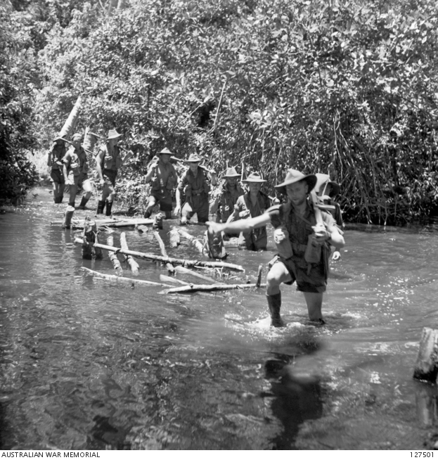 BUNA-GONA AREA, NEW GUINEA. 1942-10. MEMBERS OF 2/6TH AUSTRALIAN ...