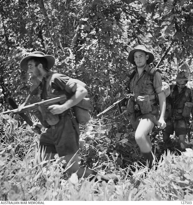 BUNA-GONA AREA, NEW GUINEA. 1942-10. TROOPER (TPR) M. HUGHES AND TPR ...