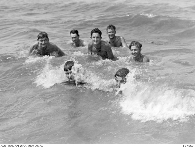 Members of 2/6th Australian Independent Company enjoy a refreshing ...