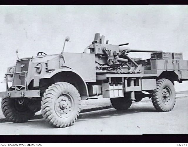 AUSTRALIA. TRUCKS, 3-TON PORTEE, WITH 40 MM BOFORS GUN. THREE-QUARTER ...