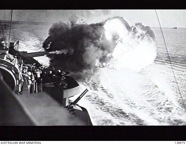 CATANIA, SICILY, ITALY. 1943-07-17. A BRITISH BATTLESHIP FIRING SHELLS ...