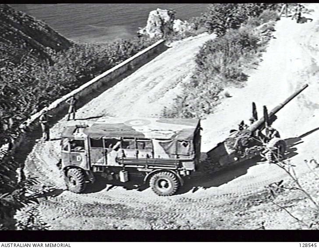 ITALY. 1943-09. A BRITISH 4.5 GUN ROUNDING A DIFFICULT BEND IN THE ...