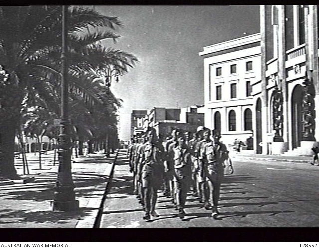 TARANTO, ITALY. 1943-09-09. RAF MEN MARCHING THROUGH THE STREETS AFTER ...