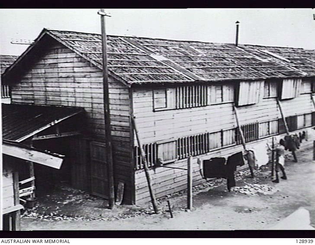 NIIHAMA YAMANE, JAPAN. C. 1945-11. EXTERIOR OF THE BARRACKS AT THE ...