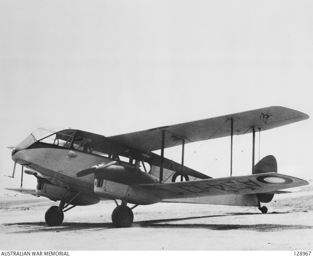 RAAF AIRCRAFT DH84 DRAGON, A34-13, AT AN AIRSTRIP. (DONOR: WING ...