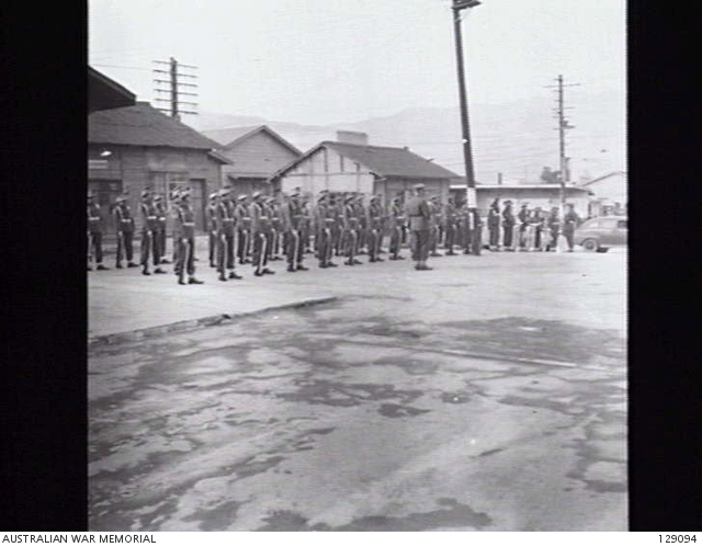 KURE, JAPAN. 1946-03-30. MEMBERS OF 34TH INFANTRY BRIGADE FORM A GUARD ...