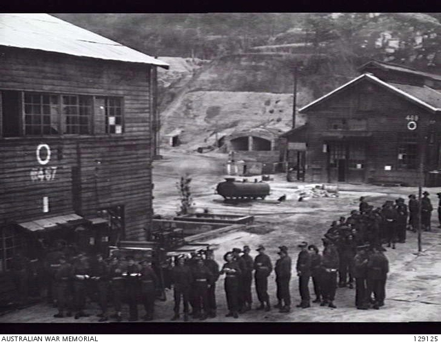 KURE, JAPAN. 1946-04-09. TROOPS FILING INTO THE CANTEEN AT BCOF ...
