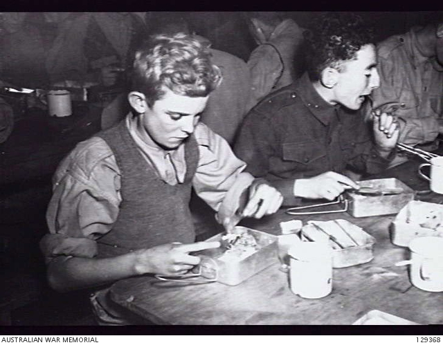 WALLGROVE, NSW. 1946-05-17. YOUNG CADETS ENJOY A MEAL IN THEIR MESS HUT ...
