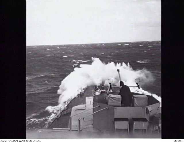 Heavy seas encountered by HMAS Shropshire as it heads from Fremantle to ...