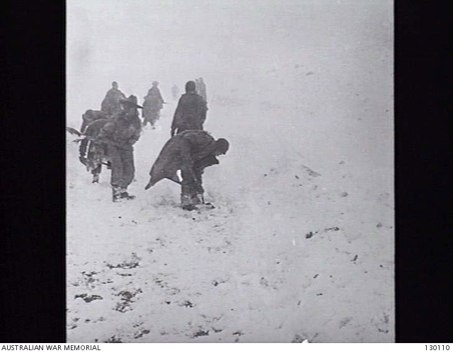 Troops from B Company, 2/2nd Infantry Battalion, shovelling snow ...