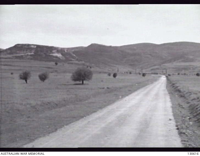 DOMOKOS, GREECE. 1945-04-23. PANORAMIC VIEW OF THE APPROACH TO DOMOKOS ...