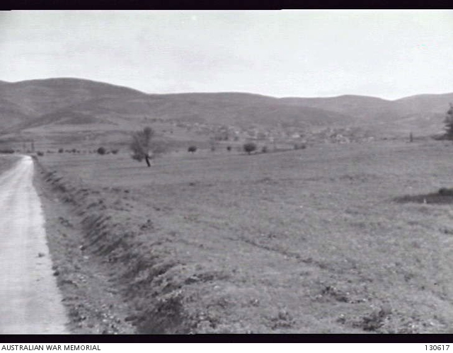 DOMOKOS, GREECE. 1945-04-23. PANORAMIC VIEW OF THE APPROACH TO DOMOKOS ...