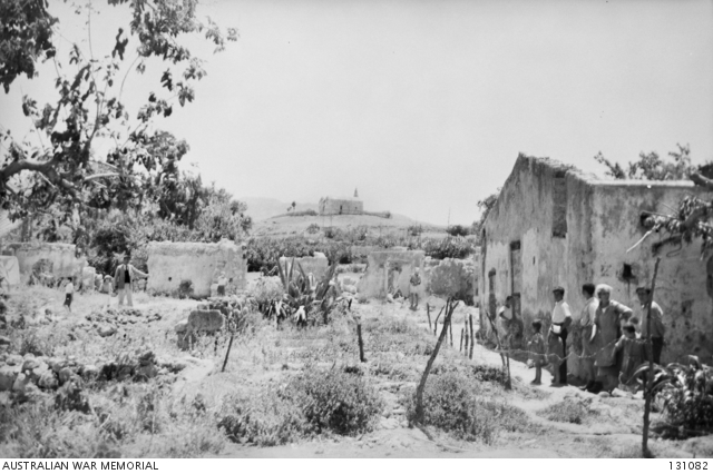 PERIVOLIA, CRETE. 1945-06-17. LOCAL PEOPLE IN THE VILLAGE NEAR RETIMO ...