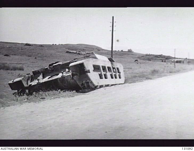 CRETE. 1945-06-17. A BRITISH HEAVY TANK DITCHED ON THE ROADSIDE NEAR ...