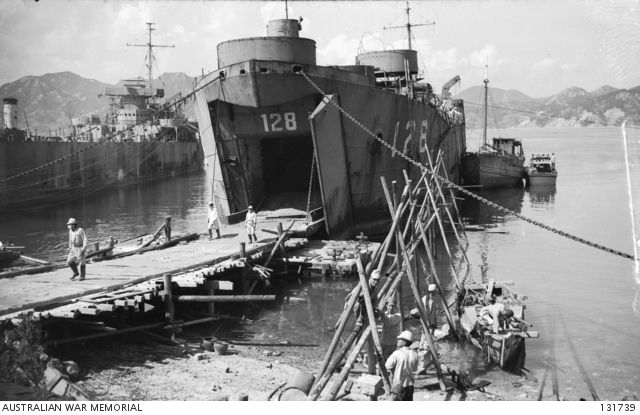 OKUNOSHIMA, JAPAN. 1946-08-03. JAPANESE LABOURERS ASSEMBLING VACUUM ...