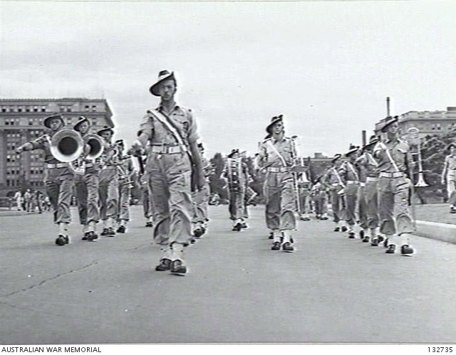 TOKYO, JAPAN. 1947-04. THE 65TH BATTALION BAND LEADING GUARDS TO THE ...
