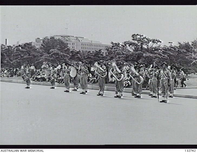 TOKYO, JAPAN. 1947-04. 65TH BATTALION BAND PLAYING WHILE GUARDS ARE ...