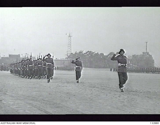KURE, JAPAN. 1947-02-13. AUSTRALIAN ARMY SERVICE CORPS COMPANY GIVING ...