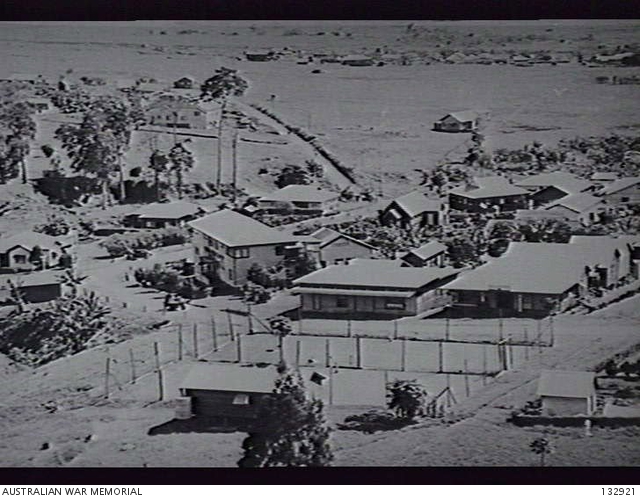 WAU, NEW GUINEA. RESIDENCES AND STORES AT THE BULOLO GOLD DREDGING ...