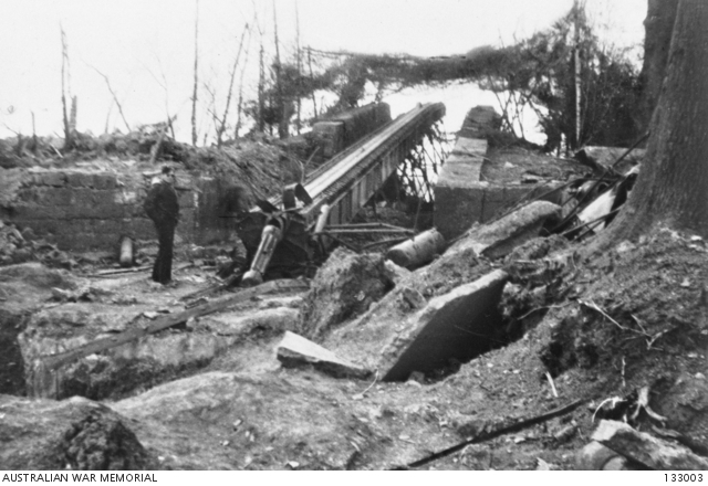 FRANCE. 1944. LAUNCHING RAMP WITH PARTLY DEMOLISHED CAMOUFLAGE FOR ...
