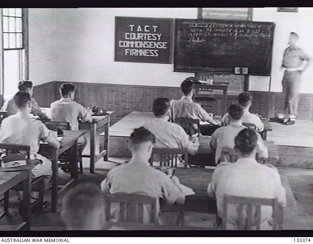 MATSUYAMA, JAPAN. 1946. STUDENTS INSIDE A CLASSROOM DURING A LECTURE AT ...