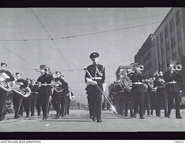 TOKYO, JAPAN. 1946. A BAND LEADS BCOF TROOPS DOWN AVENUE "A" TO THE ...