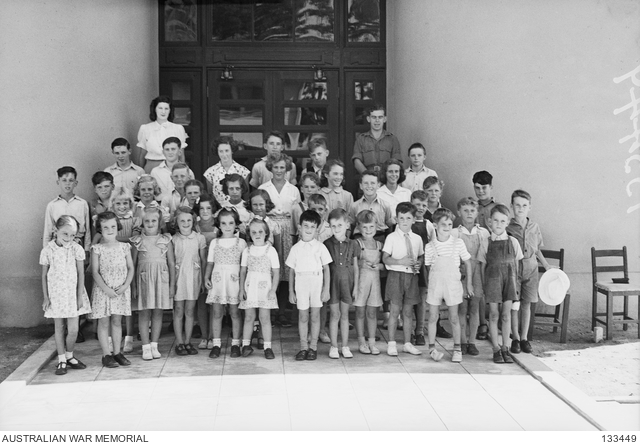 ETA JIMA, JAPAN. 1947-09-15. GROUP PORTRAIT OF TEACHERS AND PUPILS AT ...