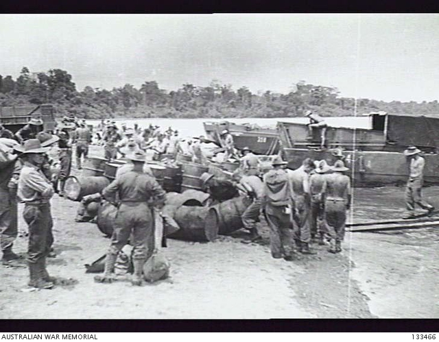 LAE, NEW GUINEA. 1943-10-02. SUPPLIES FOR THE 9TH AUSTRALIAN DIVISION ...