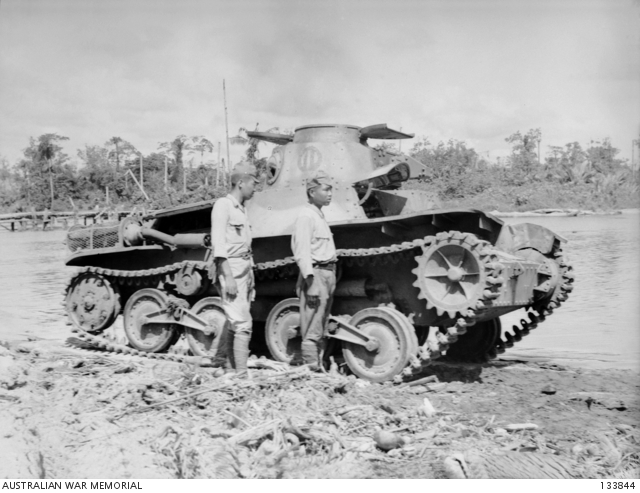 SARMI, DUTCH NEW GUINEA. C.1945-09. JAPANESE CREW STANDING BESIDE THEIR ...