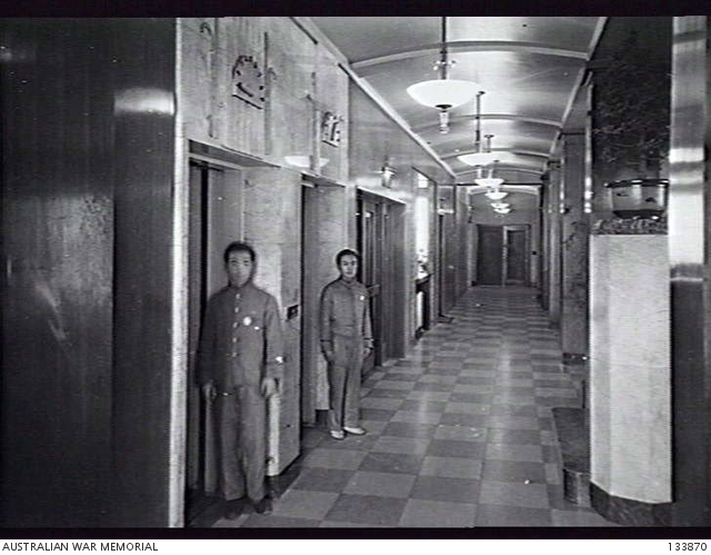 TOKYO, JAPAN. 1947. INTERIOR OF THE MARUNOUCHI HOTEL SHOWING A HALLWAY ...