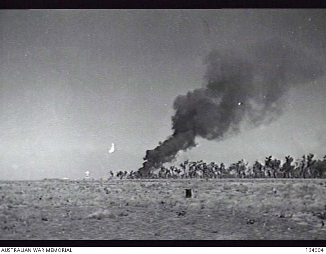 DARWIN, NT. 1942-06. AFTER A JAPANESE RAID ON DARWIN AND THE HARBOUR ...