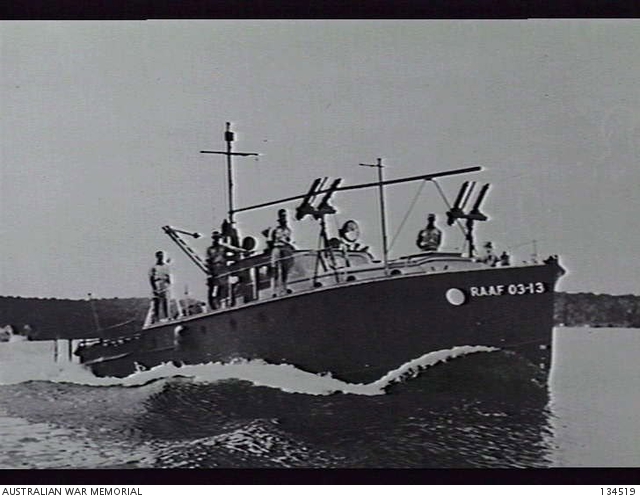 A TORPEDO RECOVERY LAUNCH, FITTED WITH MACHINE GUNS, RAAF 03-13, ON ...