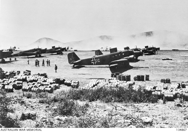 GREECE, 1941-05. GERMAN AIRCRAFT AND SUPPLIES ON A GREEK AIRFIELD ...