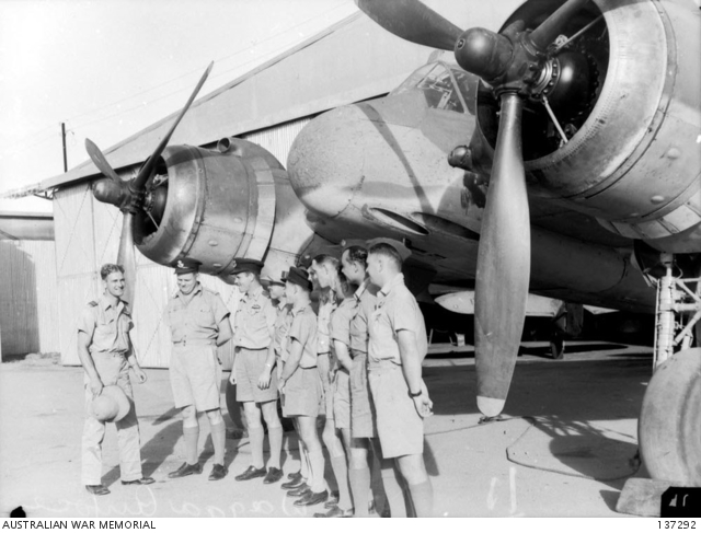 Informal portrait of officers of a RAAF Beaufighter Squadron standing ...