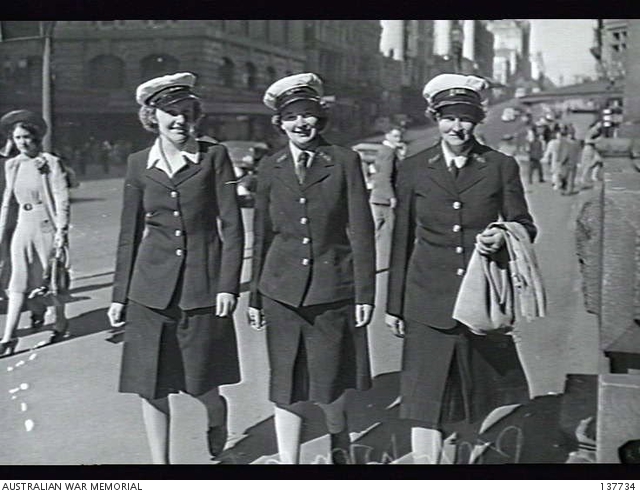 MELBOURNE, VIC. 1943-01-26. THREE POSTWOMEN WEARING THEIR NEW UNIFORM ...