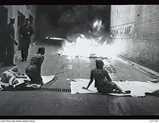MELBOURNE, VIC. 1943-01-28. WOMEN "PATIENTS" PREPARE TO TAKE PART IN AN ...