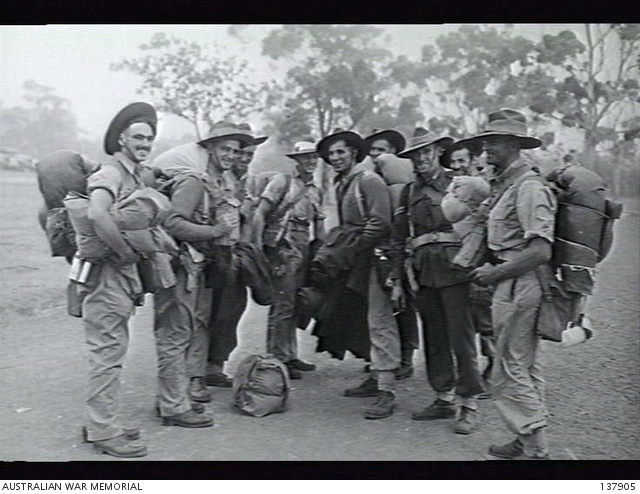 VIC. 1943-02-17. BEDRAGGLED, BATTLE WREARY AND LOADED WITH GEAR THESE ...
