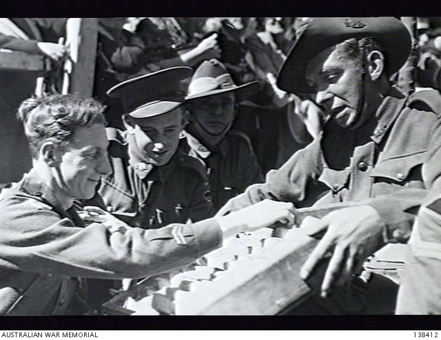 MELBOURNE, VIC. 1943-03-31. MEMBERS OF THE 9TH AUSTRALIAN DIVISION ...
