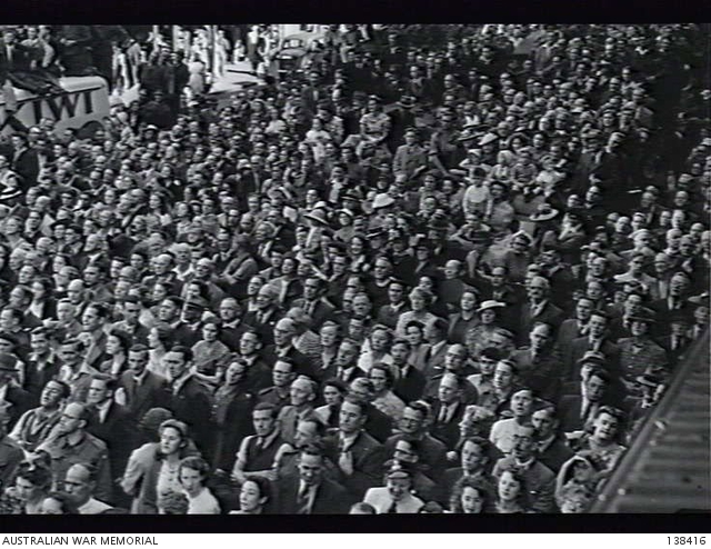 Melbourne, Vic. 1943-03-31. Crowds lining the route for the march of ...