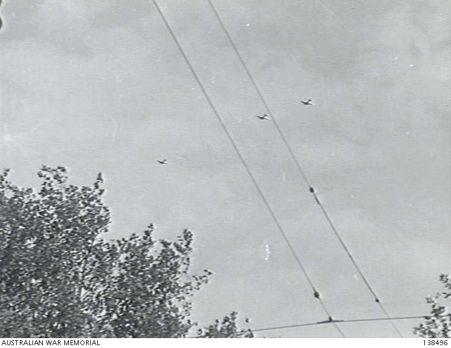 Melbourne, Vic. 1943-04-03. Bombers of the RAAF flying over the city ...